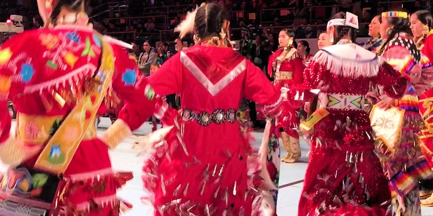 Tia Wood Heads a Sea of Red Jingle Dancers 2017 GON Tribute